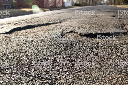 CS 639 Potholes Object Detection Dataset and Pre-Trained Model by sammysamosa