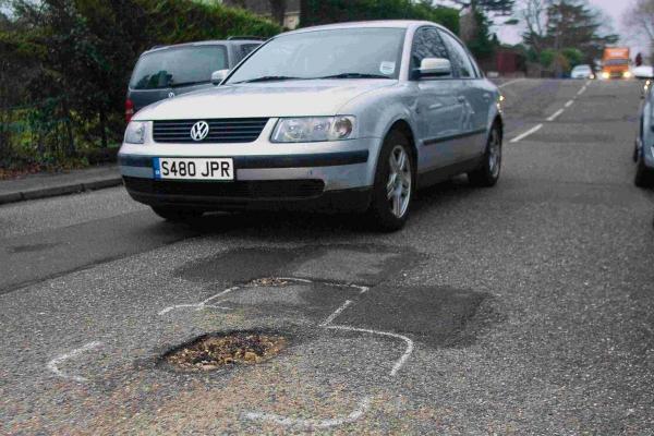 pothole detection Object Detection Dataset and Pre-Trained Model by strawhats